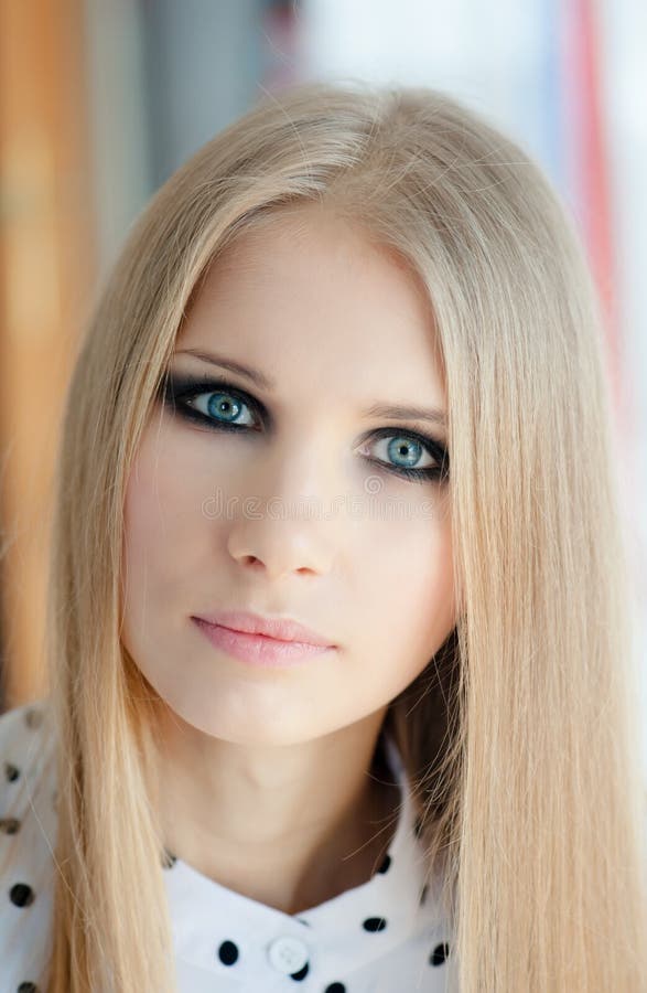Beautiful Blonde Girl with Beautiful Professional Make-up Stock Photo ...