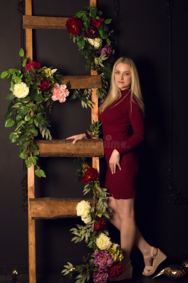 The Beautiful Blonde in a Red Dress in the Studio Stock Image - Image ...