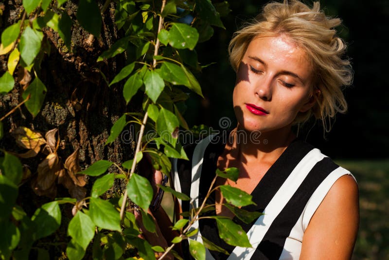 Beautiful Blonde Woman in the Autumn Forest at Sunset Stock Image ... Beautiful Blonde Woman in the Autumn Forest at Sunset Stock Image ...