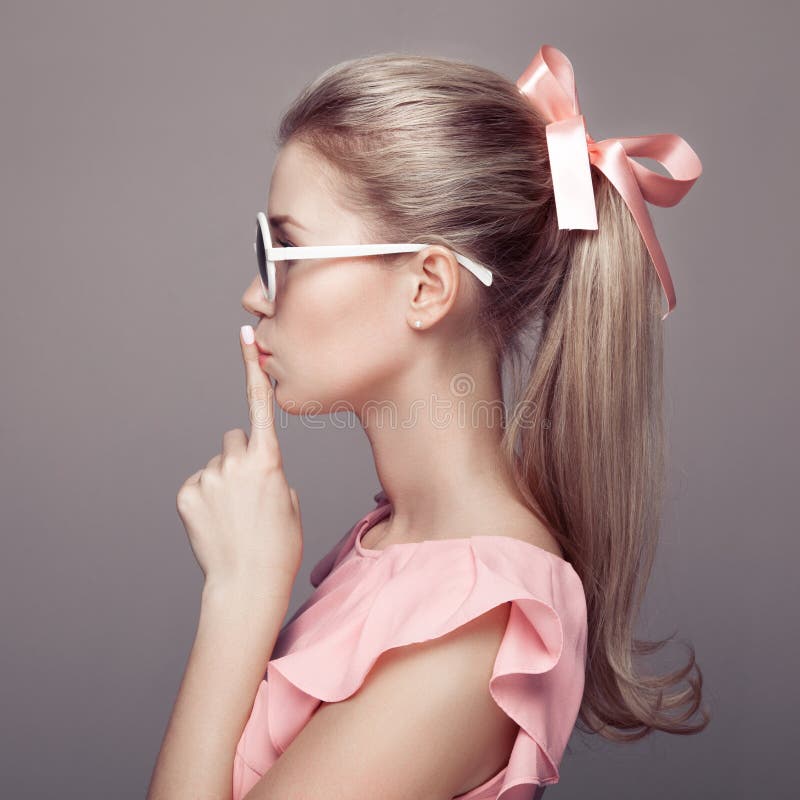 Beautiful Blonde Woman Blowing Bubble Gum Fashion Portrait Stock