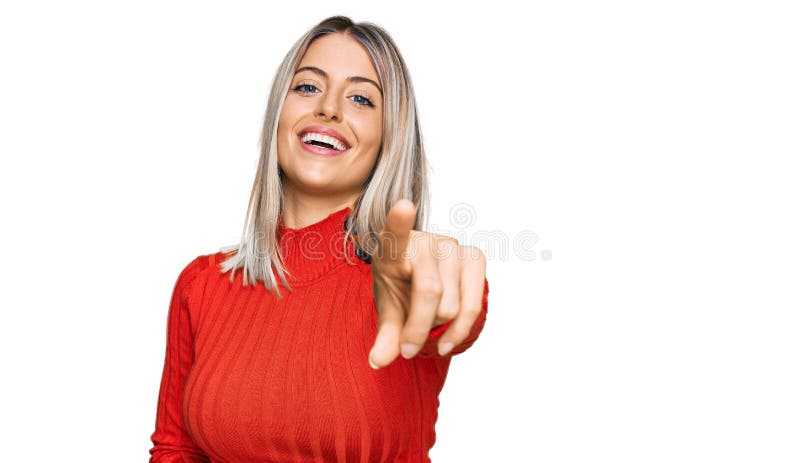 Beautiful Blonde Woman Wearing Casual Clothes Laughing At You Pointing