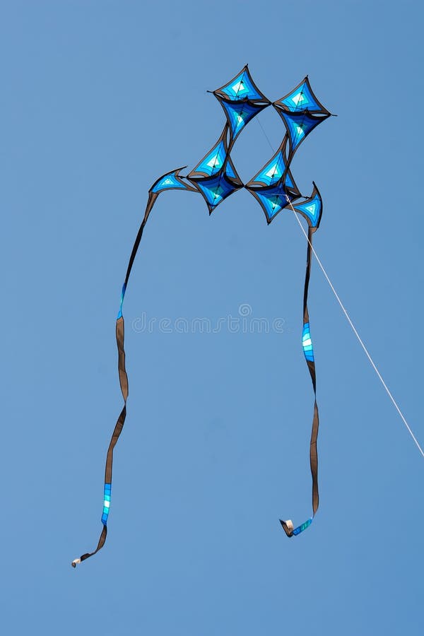 Beautiful Blue and Grey Kite in a Clear Blue Sky Stock Image - Image of ...