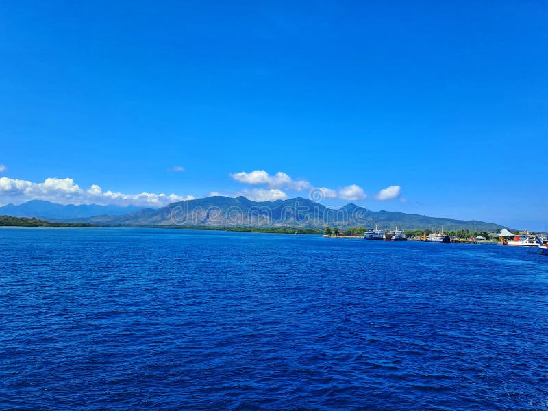 The Beautiful Blue Sea in the Gilimanuk Strait Stock Photo - Image of ...