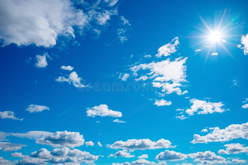 Beautiful Blue Sky with Air Clouds and Sun Rays Stock Photo - Image of ...