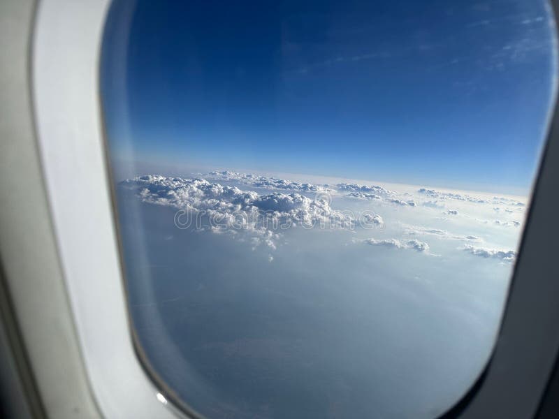 Beautiful Blue Sky with Fluffy Clouds, View from Plane Window Stock ...
