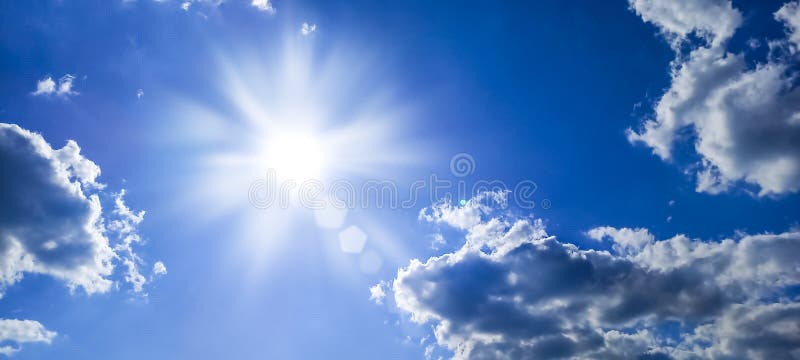Beautiful Blue Sky with Sun Beam Behind Cloud Stock Photo - Image of ...