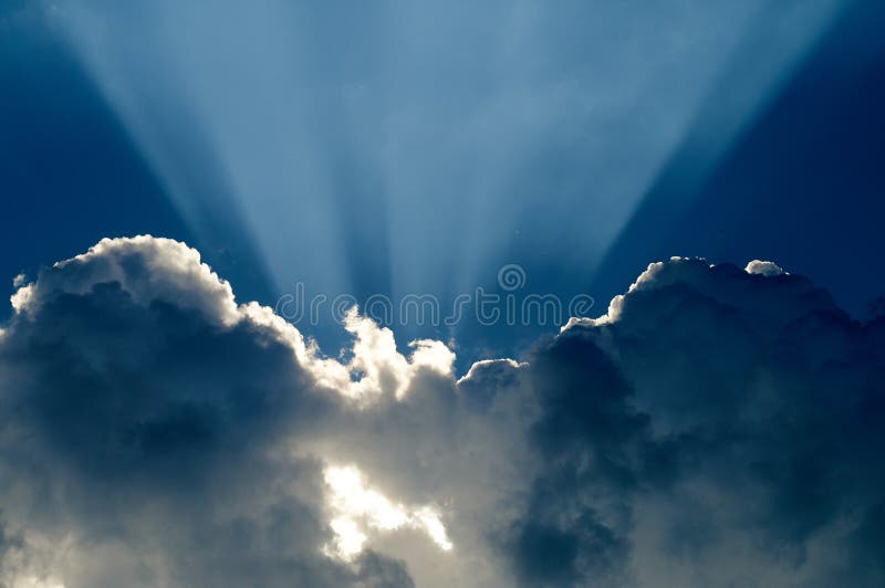 Beautiful Blue Sky with Sunbeams and Clouds. Sun Rays Stock Photo ...