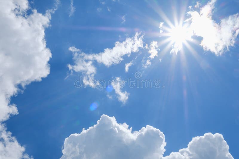 Beautiful Blue Sky with Sunbeams and Clouds. Sun Rays. Stock Photo ...