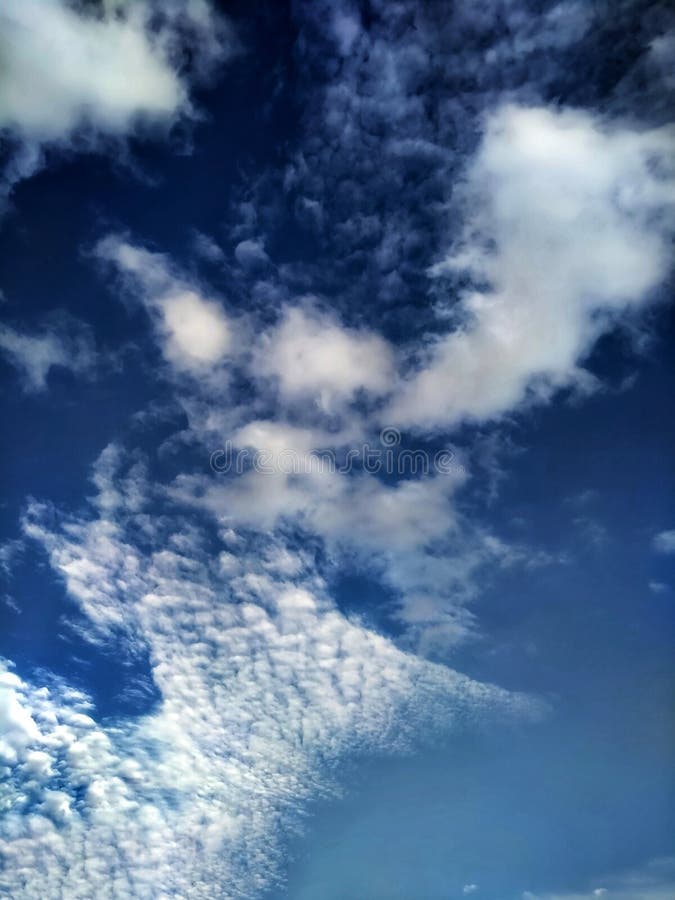 Beautiful Blue Sky with Various Types of Clouds Scattered Throughout ...