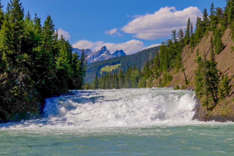 Bow Falls and River in Banff Stock Photo - Image of sunny, clouds ...