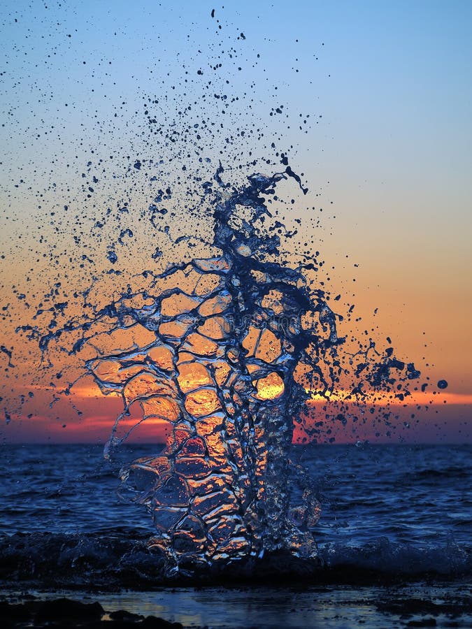 Beautiful Blue Splash at Sunset Background Stock Image - Image of ...
