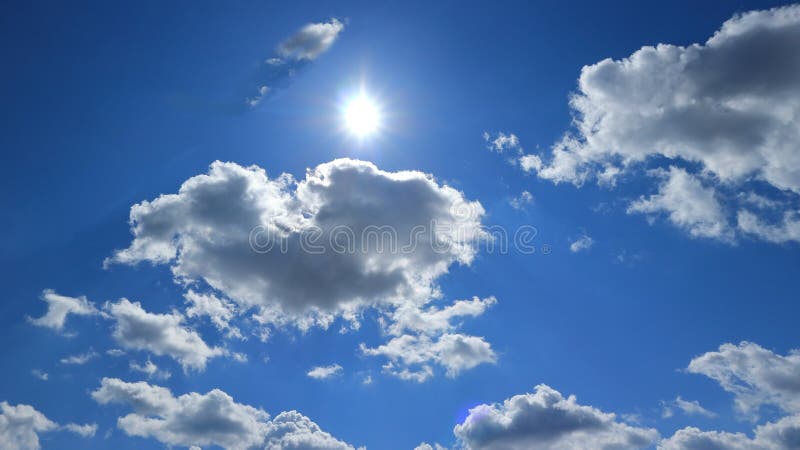 Beautiful Blue Spring Sky with Textured Clouds and Bright Sun. Stock ...