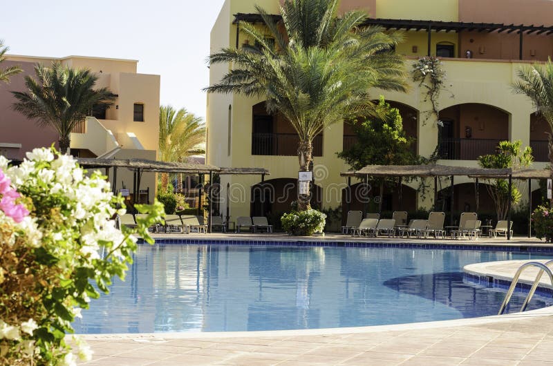 Beautiful Blue Swimming Pool at the Hotel. Stock Image - Image of ...