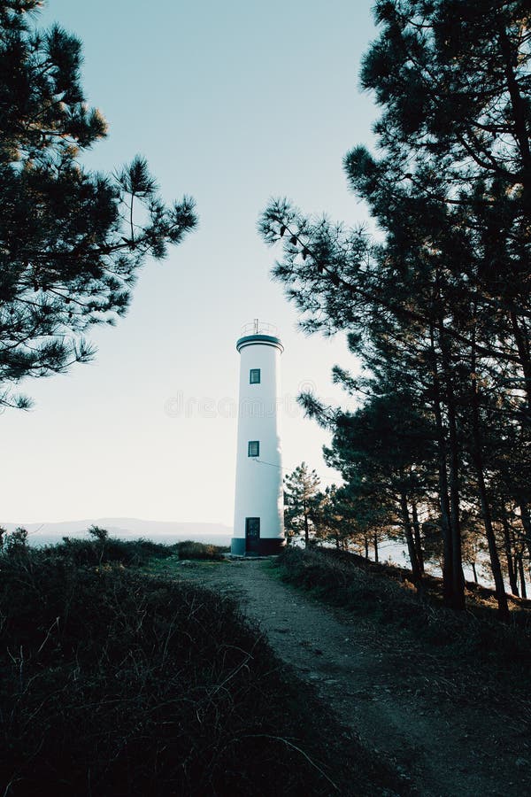 Beautiful Blue and White Lighthouse in the Coastline of Spain Stock ...
