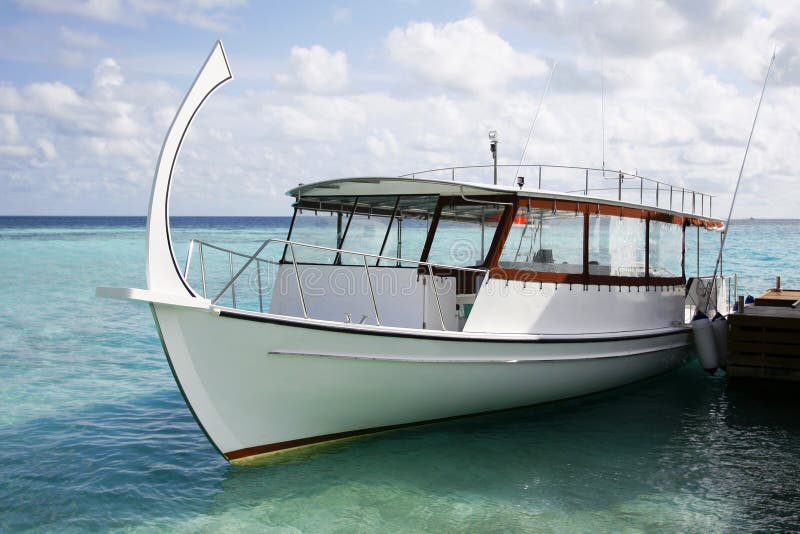Beautiful boat stock photo. Image of ocean, clear, jetty - 4459448