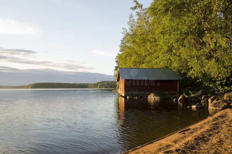 Beautiful Boathouses on the Lake at Sunset Stock Image - Image of ...