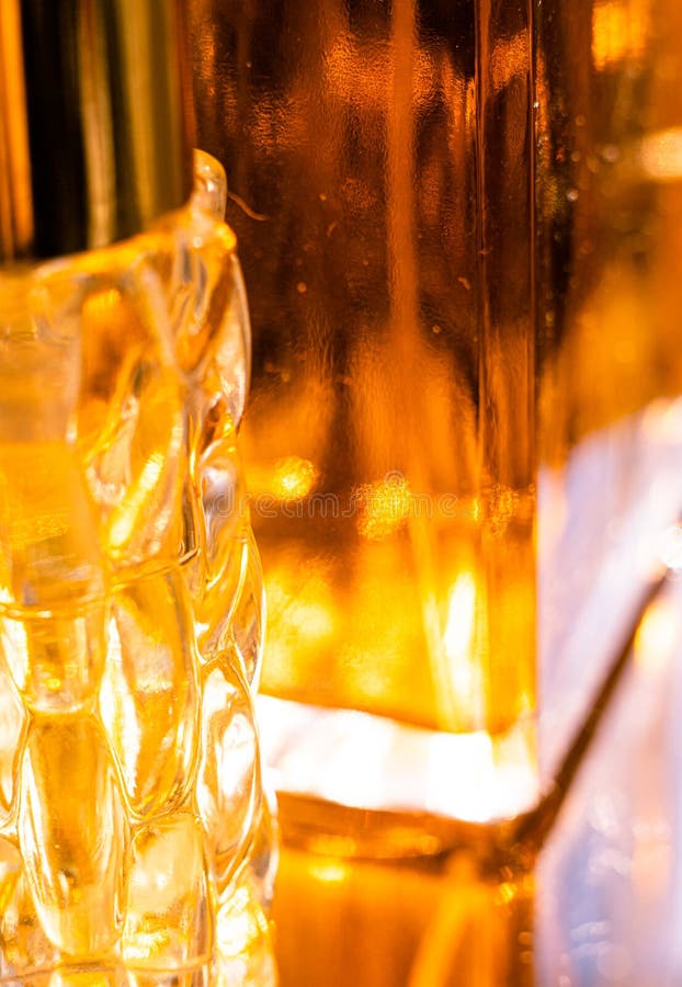 Beautiful Bokeh and Light Reflections in Yellow Glass Perfume Bottles ...