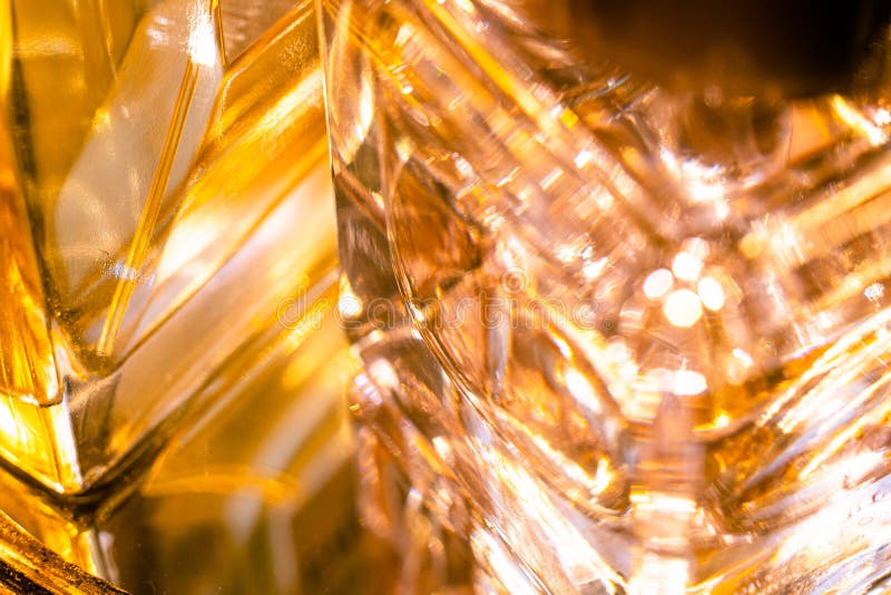 Beautiful Bokeh and Light Reflections in Yellow Glass Perfume Bottles ...