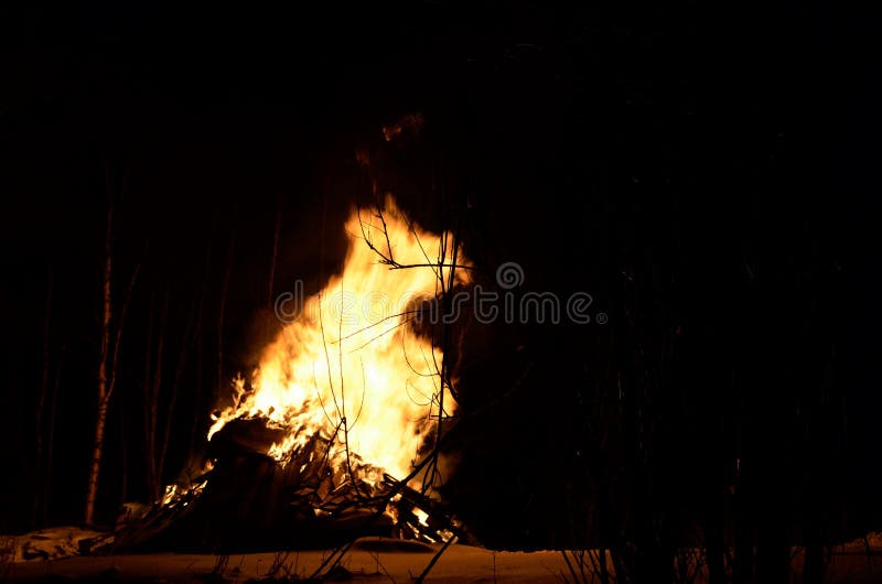 Beautiful Hot Burning Tall Flames from Bonfire on Dark Winter Stock ...