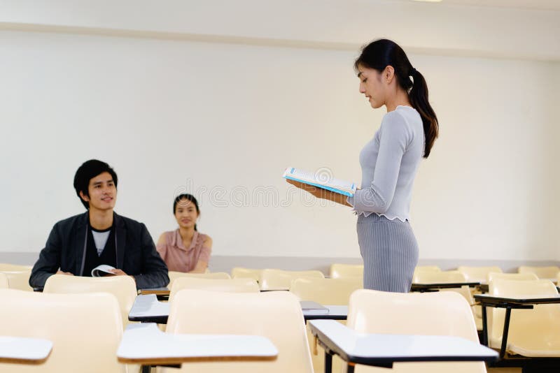 Beautiful Bookworm Reading in Classroom Stock Photo - Image of face ...