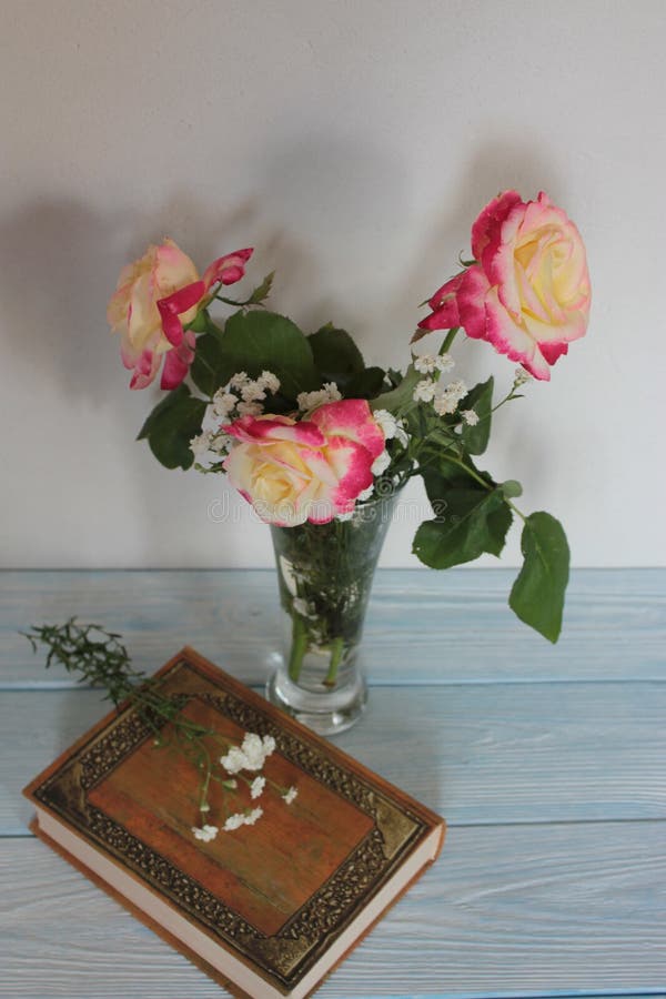 A Bouquet of Red Roses on a Light Wooden Surface. Stock Photo - Image ...