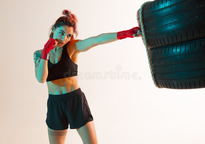 Beautiful Boxer Girl Posing for a Photo in the Studio. Stock Photo ...
