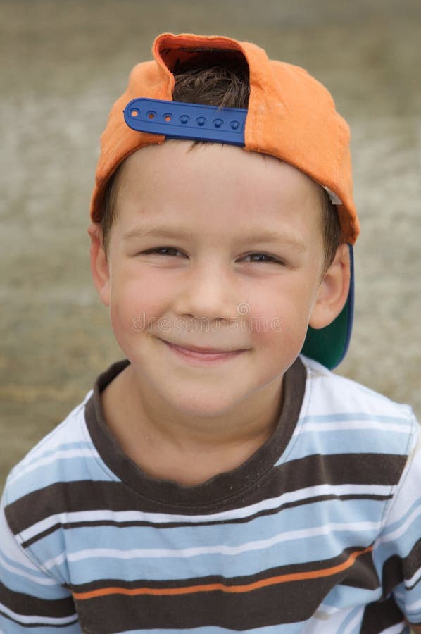 Beautiful Boy with Cap Smiling Stock Photo - Image of relax, beautiful ...