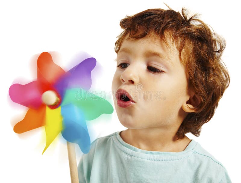 Beautiful Boy Having Fun with Wind Mill Stock Image - Image of smile ...