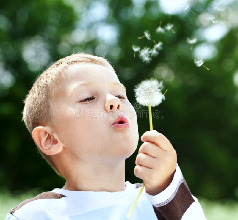 Boy eating banana stock photo. Image of emotion, grass - 25168594