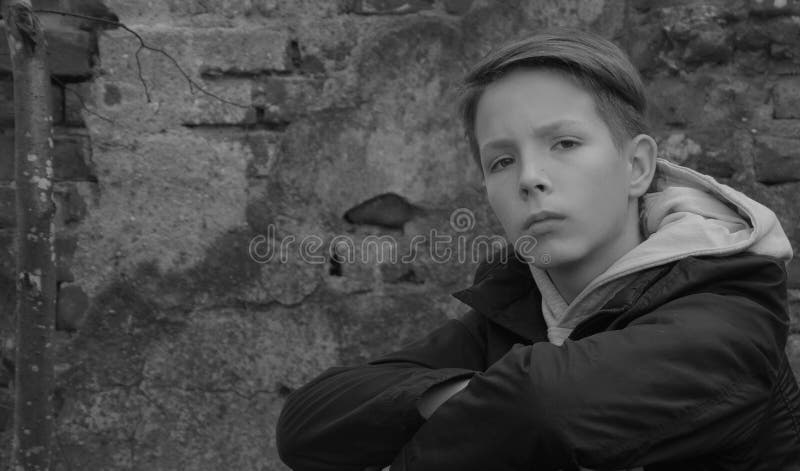 A Boy with a Smart Look Looks at the Camera. Stock Photo - Image of ...