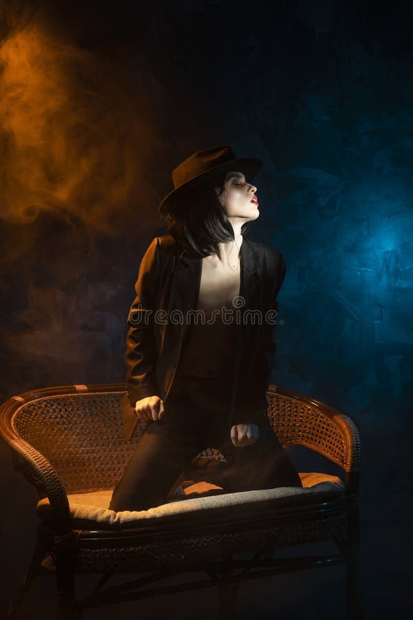 Beautiful Braless Slim Girl Wearing A Unbuttoned Black Blazer With A