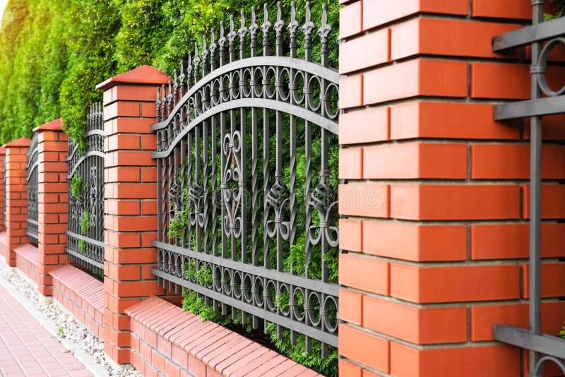 Beautiful Brick Fence with Iron Railing Outdoors Stock Image - Image of ...