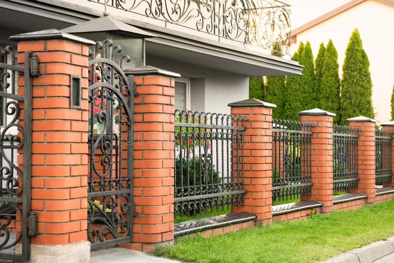 Beautiful Brick Fence with Iron Railing Outdoors Stock Image - Image of ...