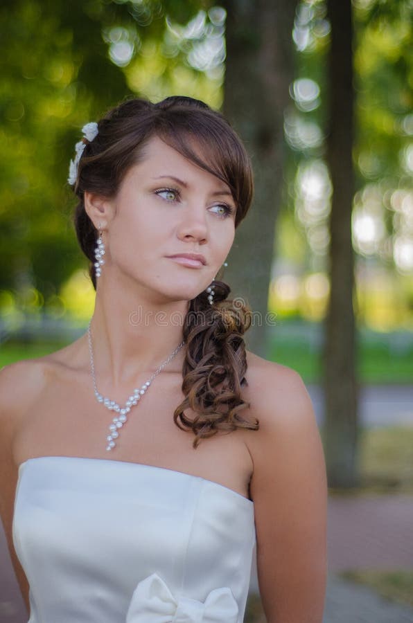 Beautiful Bride is Dreaming in Her Wedding Day Stock Image - Image of ...