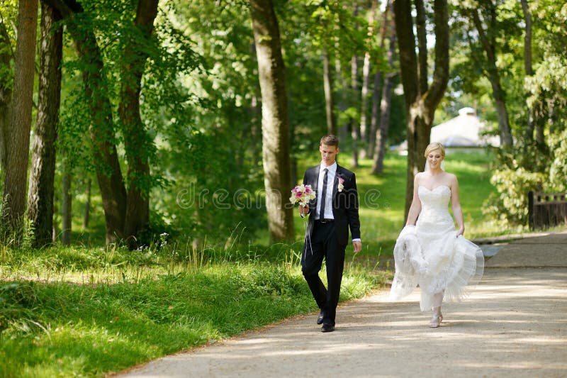 Bride and Groom Posing by a Car Stock Photo - Image of hands, girl ...