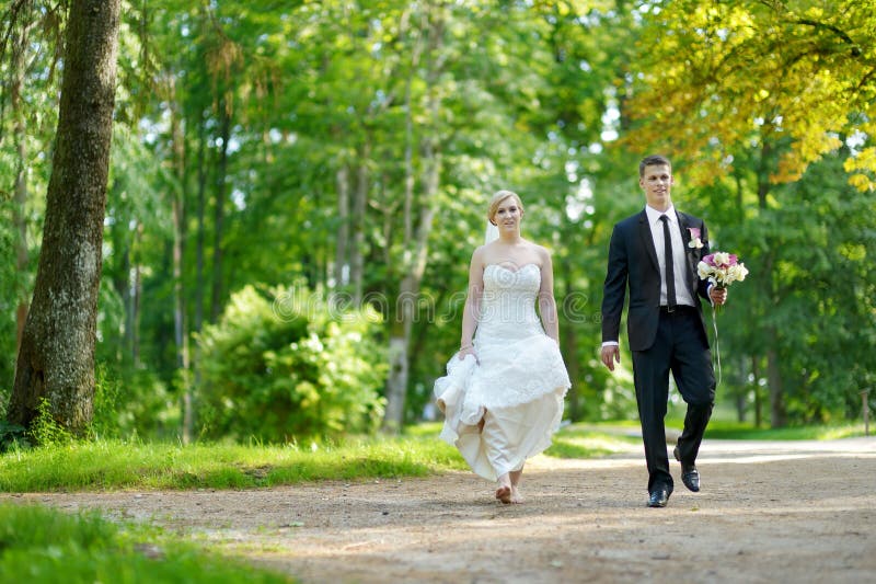 Bride and Groom Posing by a Car Stock Photo - Image of hands, girl ...