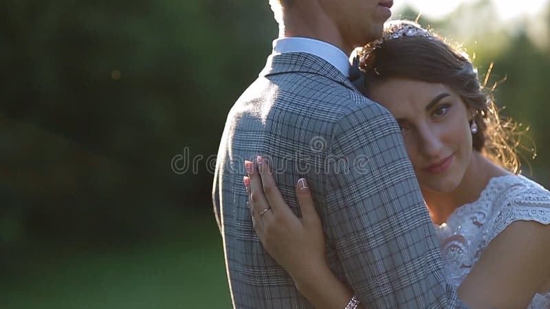 Beautiful Bride and Groom Walking in the Park before the Wedding ...