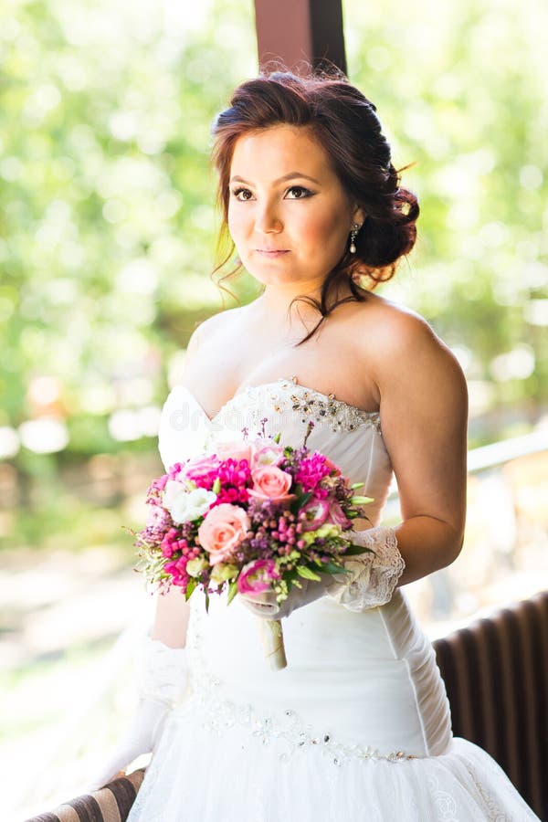 Beautiful Bride Holding Big Wedding Bouquet Stock Photo - Image of ...