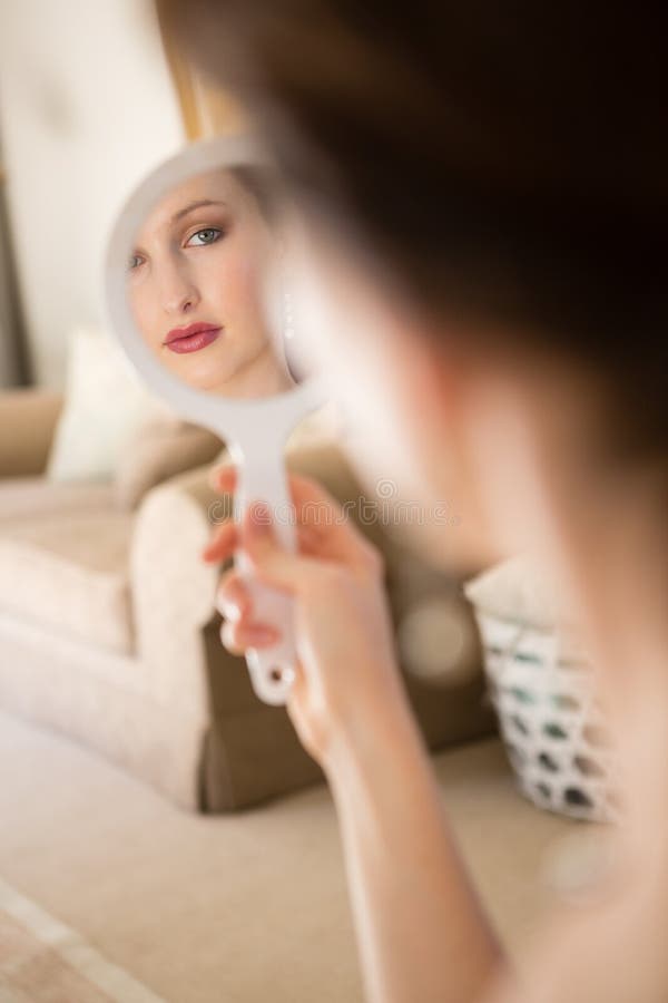 Beautiful Bride Looking into Hand Mirror Stock Photo - Image of closeup ...