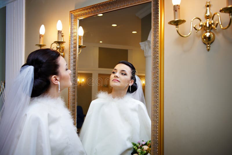 Beautiful Bride Near Mirror Stock Photo - Image of love, gold: 14376848