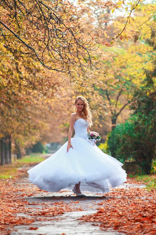 Beautiful Bride Outdoors in a Forest. Stock Image - Image of park ...