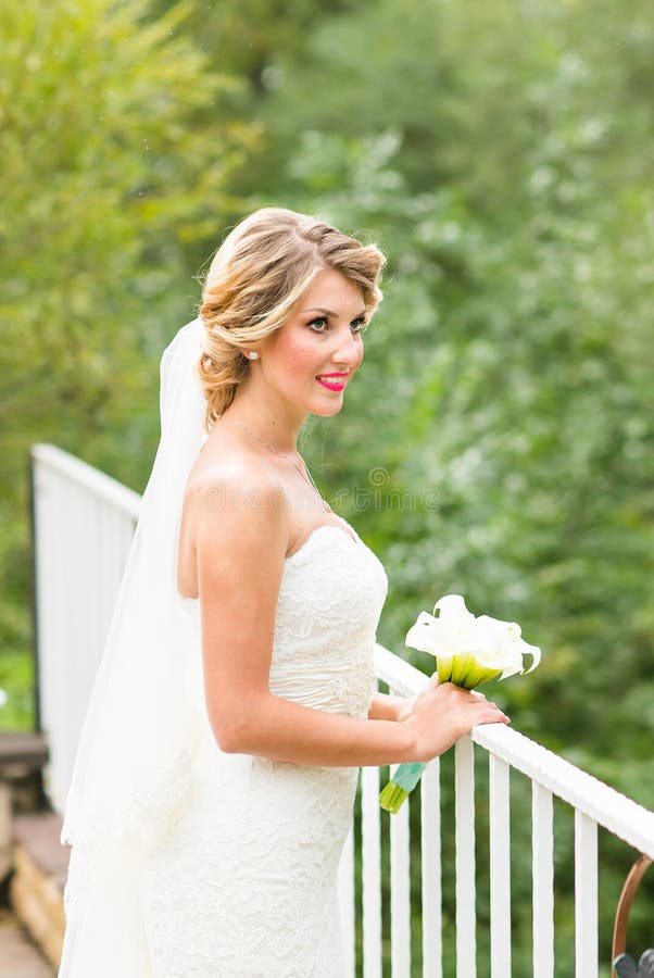Beautiful Bride Posing in Her Wedding Day Stock Photo - Image of bride ...
