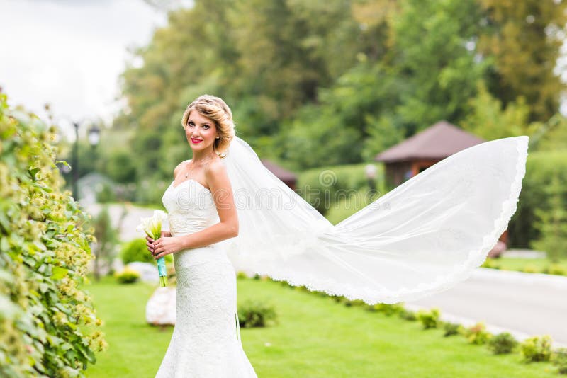 Beautiful Bride Posing in Her Wedding Day Stock Image - Image of female ...