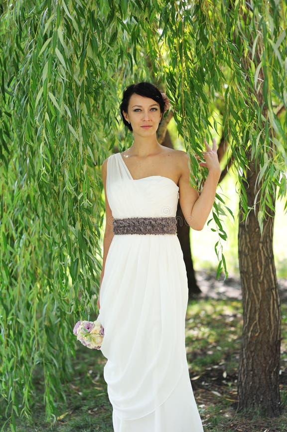 Beautiful Bride Posing Outdoors on Wedding Day Stock Image - Image of ...