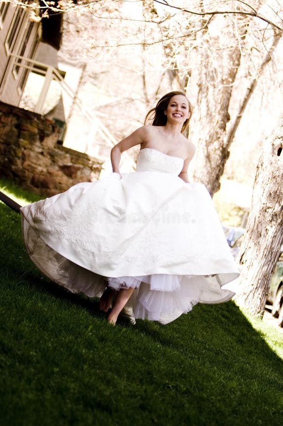 Beautiful Bride Running stock image. Image of dress, crouched - 2606215