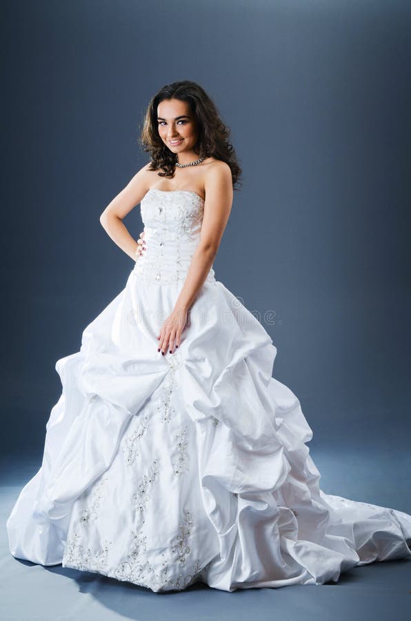 Beautiful bride posing stock photo. Image of dress, isolated - 16085360