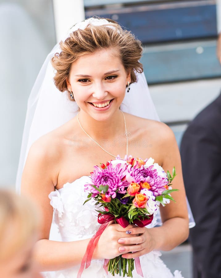 Beautiful Bride at the Wedding Reception Stock Photo - Image of flowers ...