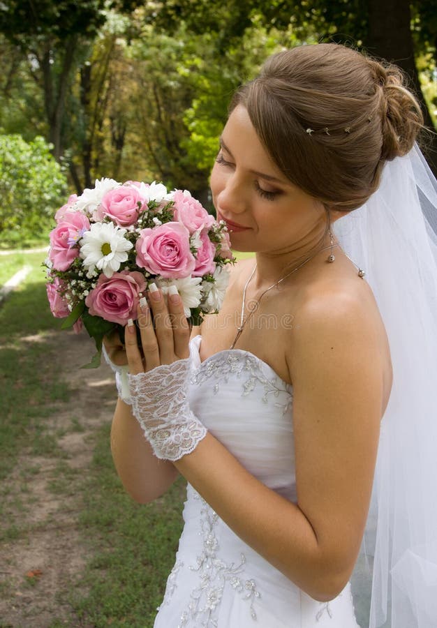 Beautiful Bride Wiht Wedding Flowers Stock Image - Image of newlyweds ...