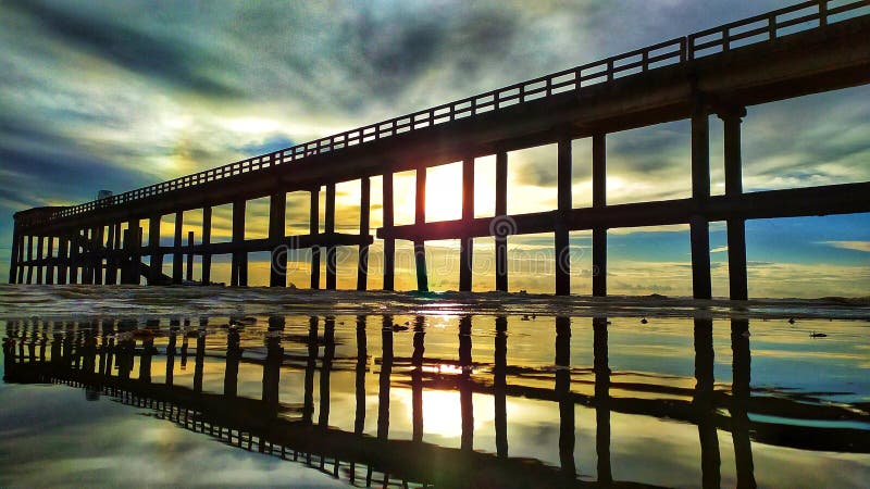 Beautiful Bridge in Sea Beach with Beautiful Sunset Stock Photo - Image ...