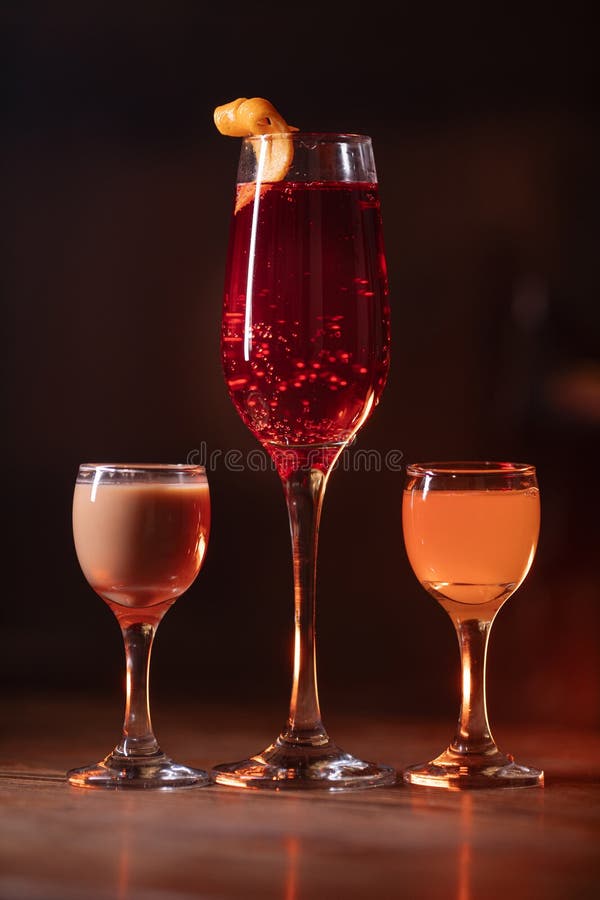 A Beautiful Bright Cocktail. Restaurant, a Glass with a Drink is on the ...